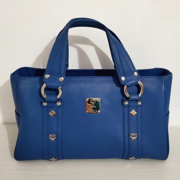 MCM | Bags | Mcm Blue Pebbled Leather Handbag Silver Studded Logo ...